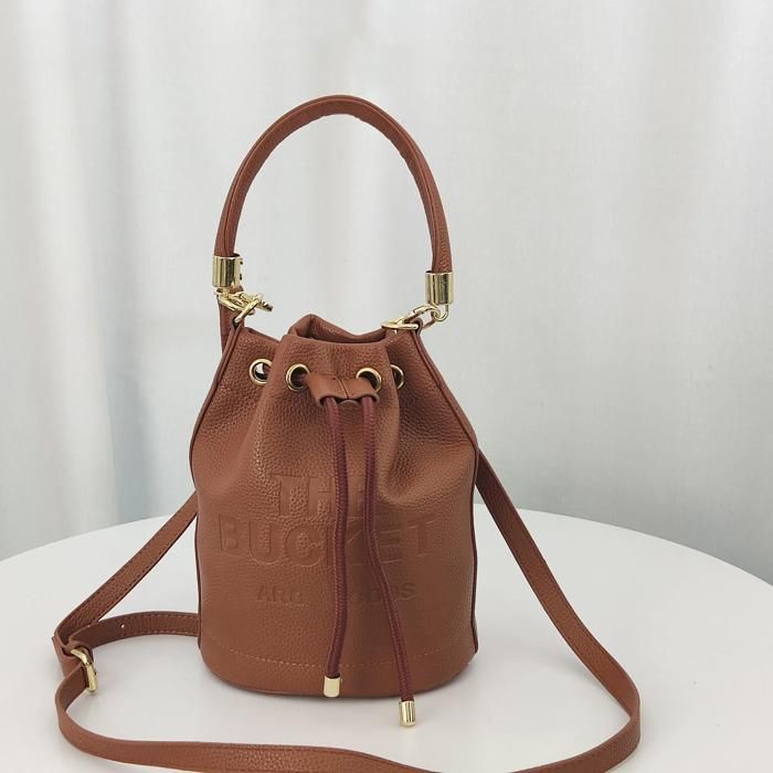 Sacs de créateurs Luxe Le sac de seau en cuir Femmes Hommes Designer ...