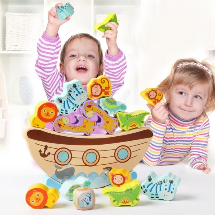 L'équilibre empilé par animal en bois joue aux bébés des jeux parentaux ...